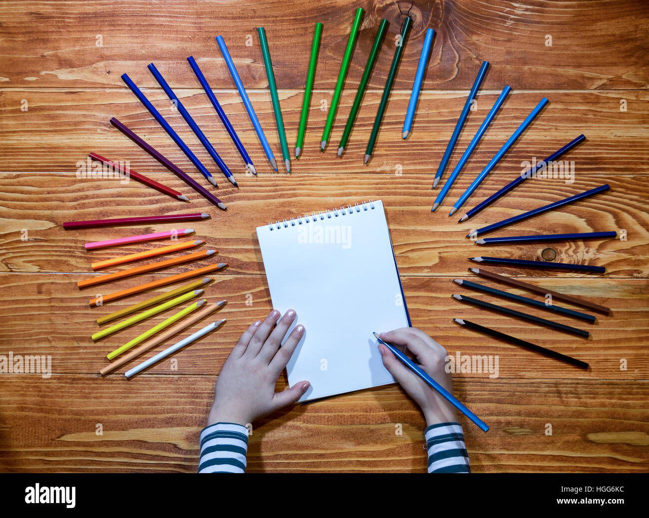 Child writing with pencil hi-res stock photography and images - Alamy