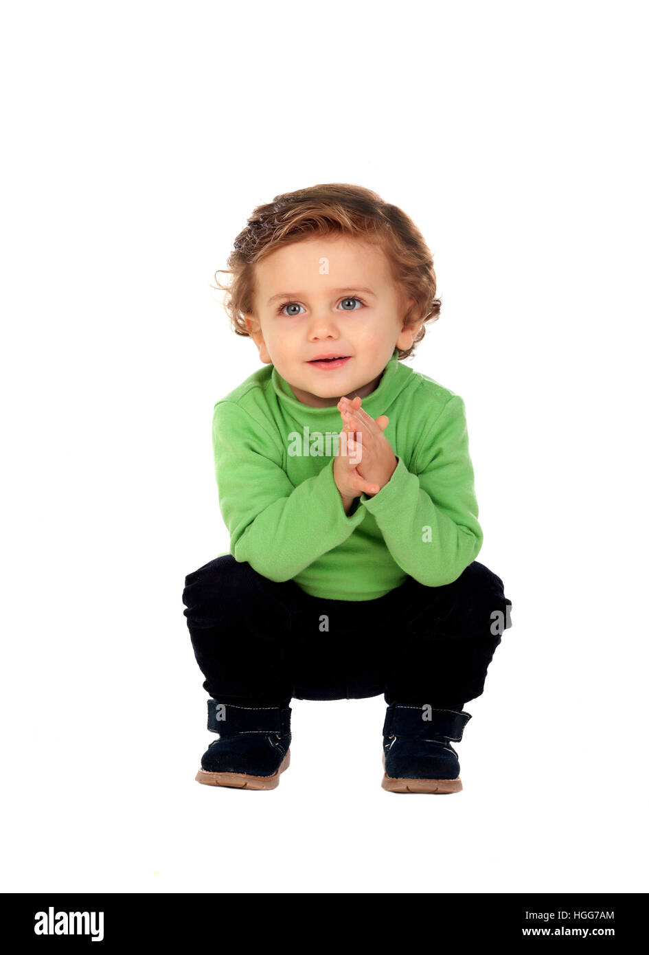 Adorable baby crouching down isolated on a white background Stock Photo ...