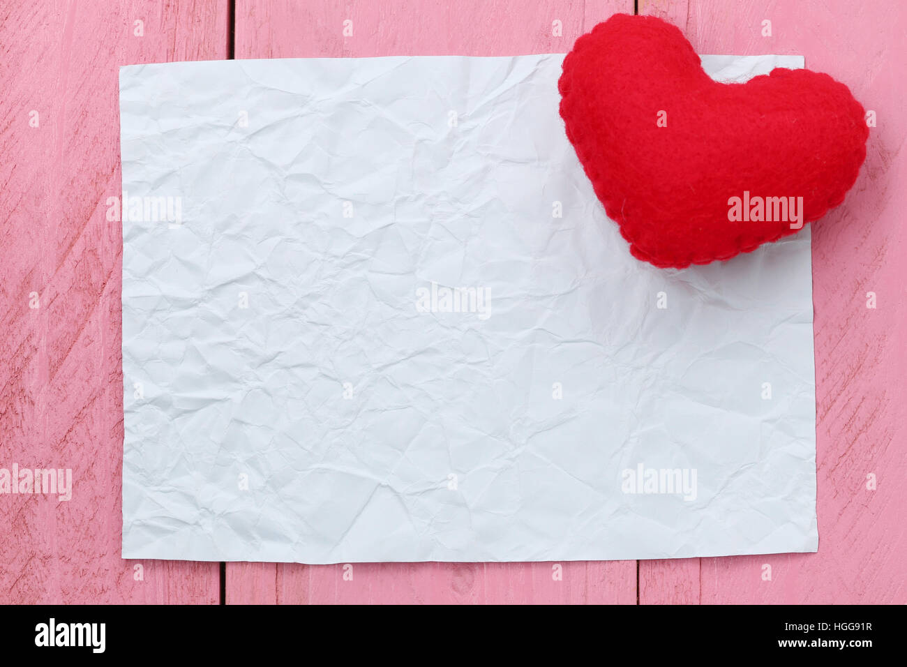 Red heart placed on paper note of empty for input text or message in ...