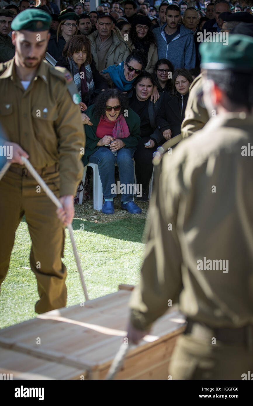 Coffin lowered hi-res stock photography and images - Alamy