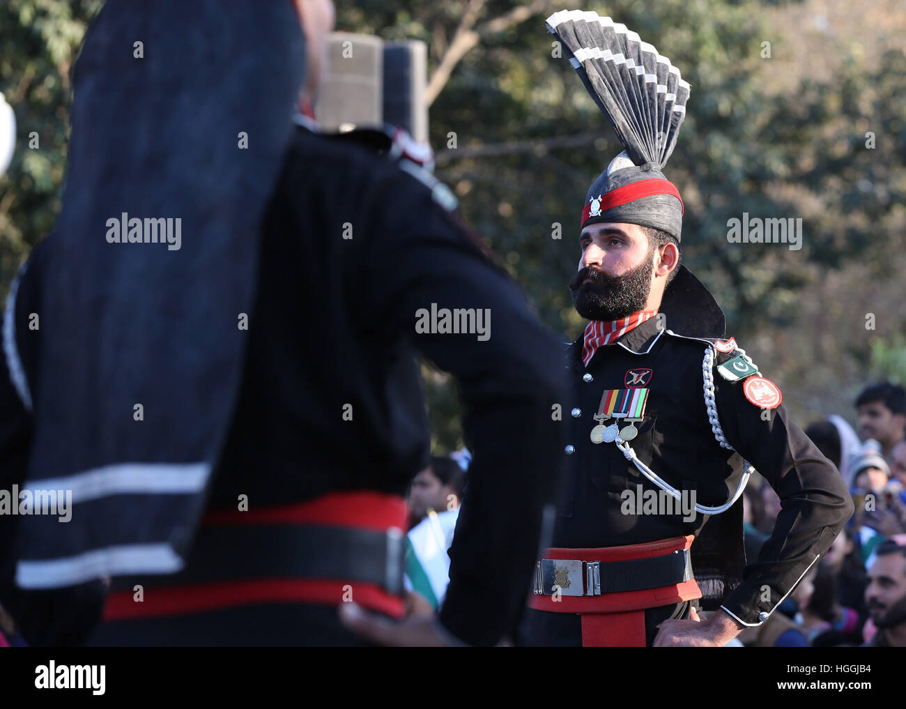 Lahore. 9th Jan, 2017. A Pakistani ranger stands during a flag lowering ...