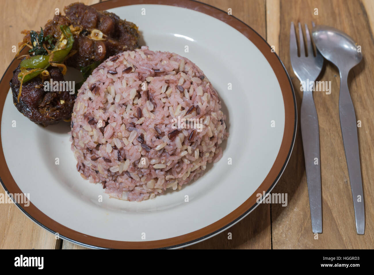 Thai food:Spicy stir-fried catfish served with rice berry Stock Photo ...