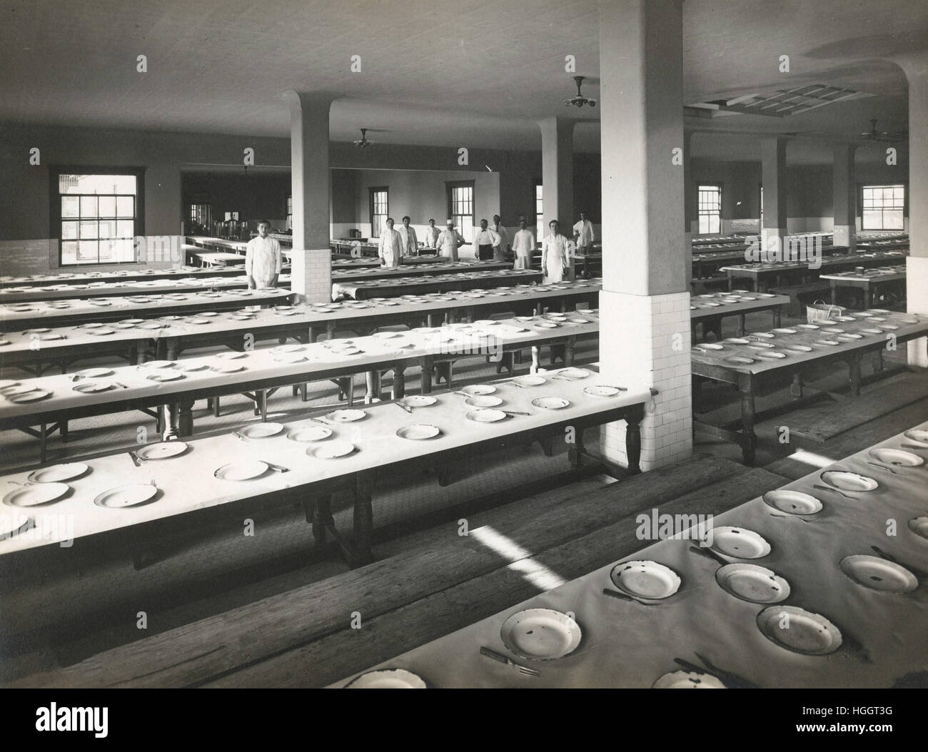 Large dining hall, empty except for about ten members of the dining ...