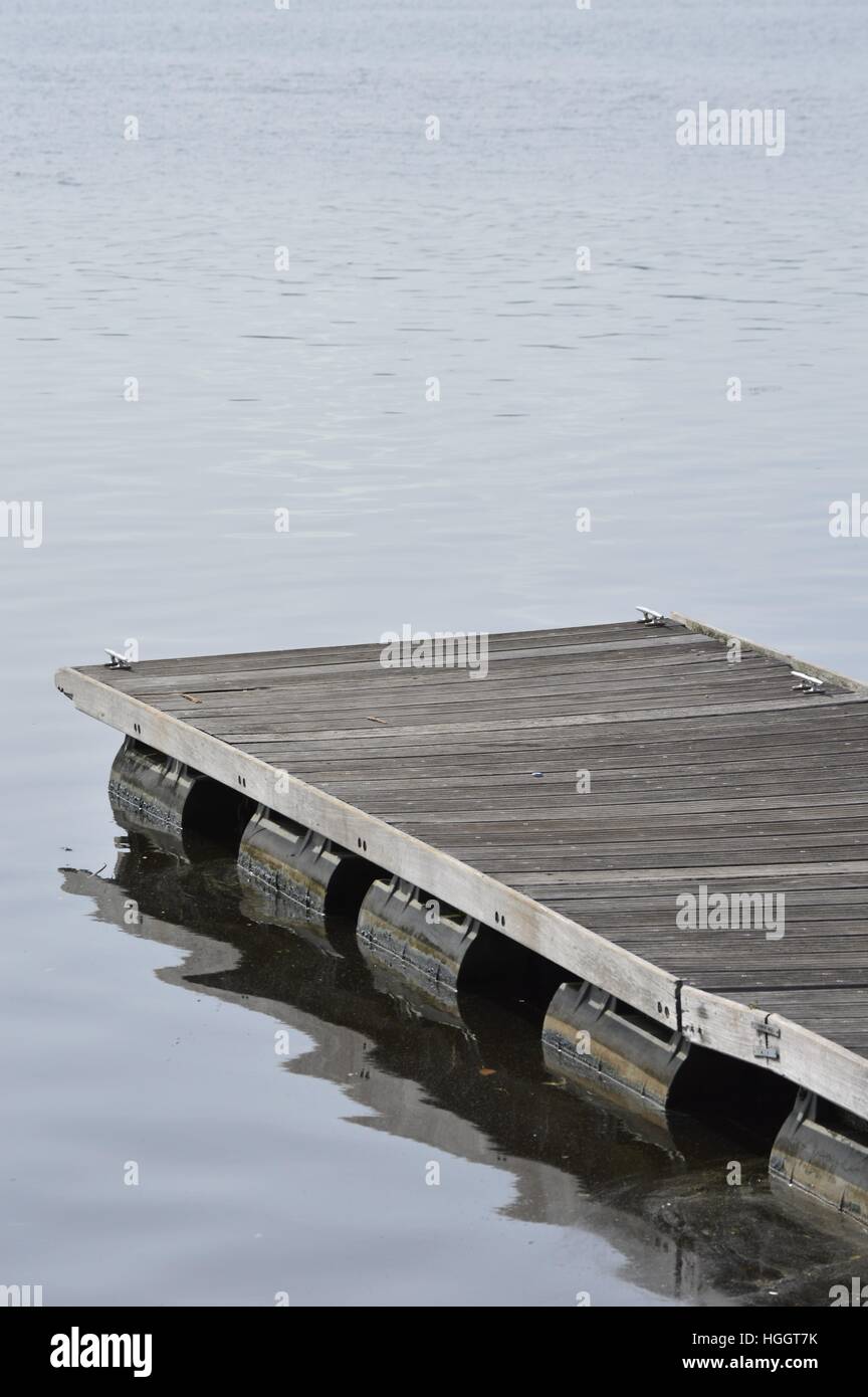 Floating wooden pier on the Caroni river, Venezuela. Detail view of a ...