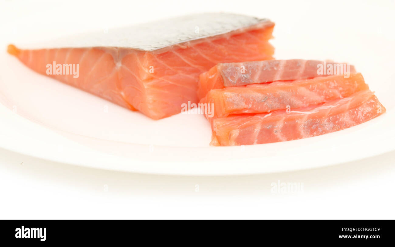 piece of red fish fillet isolated on white Stock Photo - Alamy