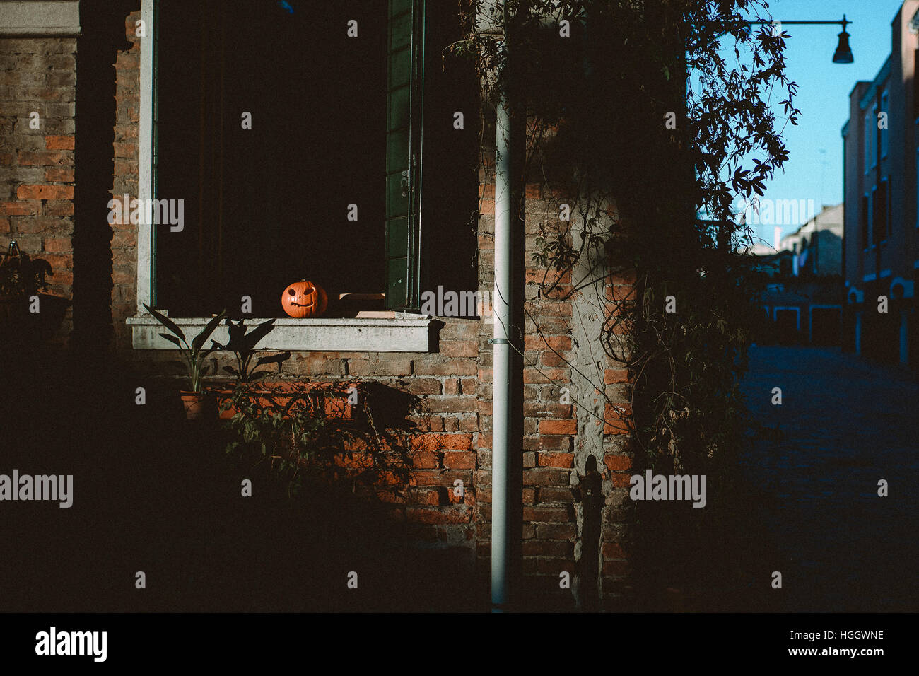 A pumpkin face in a window for Halloween in Venice, Italy Stock Photo ...