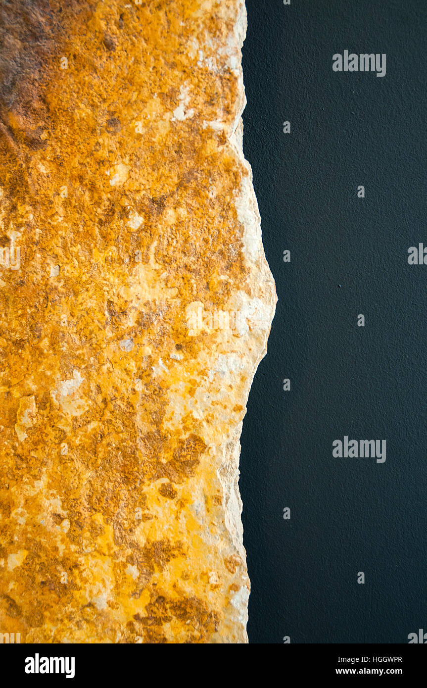 Stone edge against black background Stock Photo - Alamy
