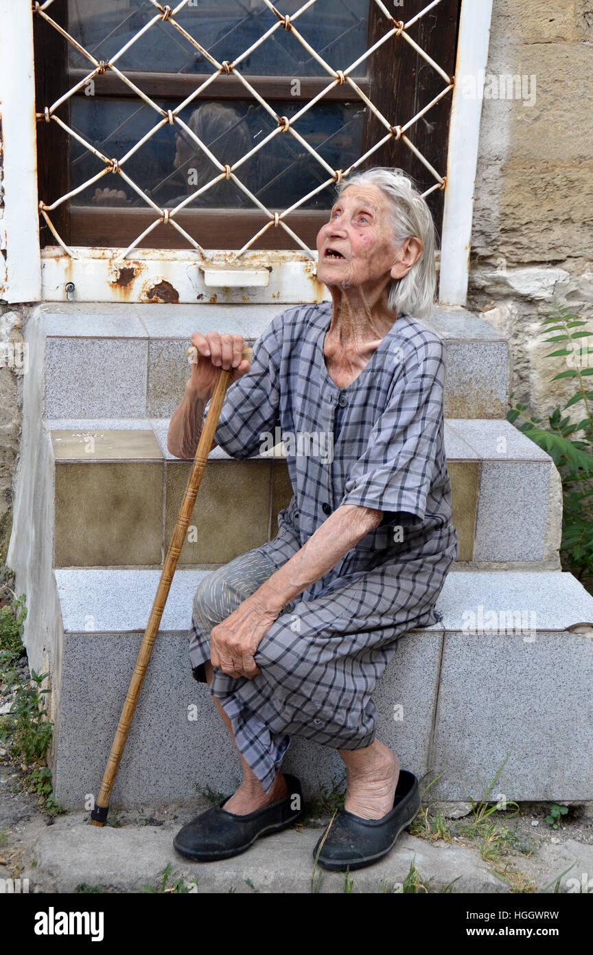 Old Lady Walking With Cane