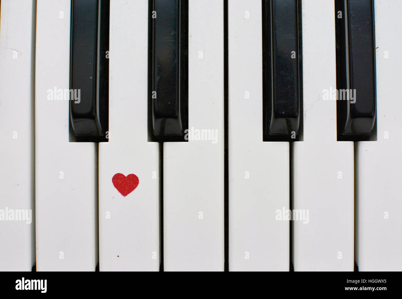 Red Heart on Piano keys Stock Photo - Alamy
