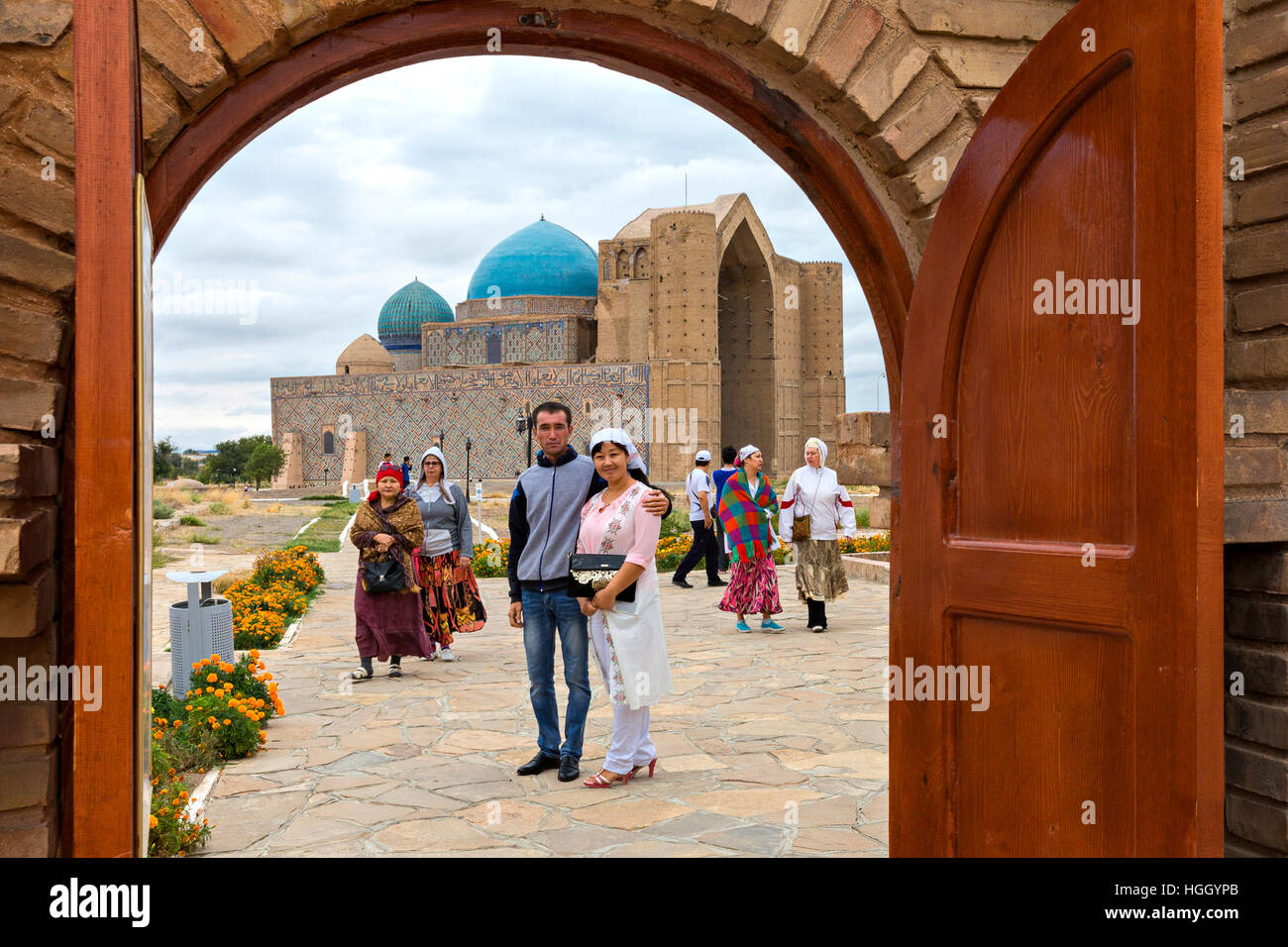 Kazakh people visiting the Khoja Ahmed Yasawi Mausoleum in Turkestan ...