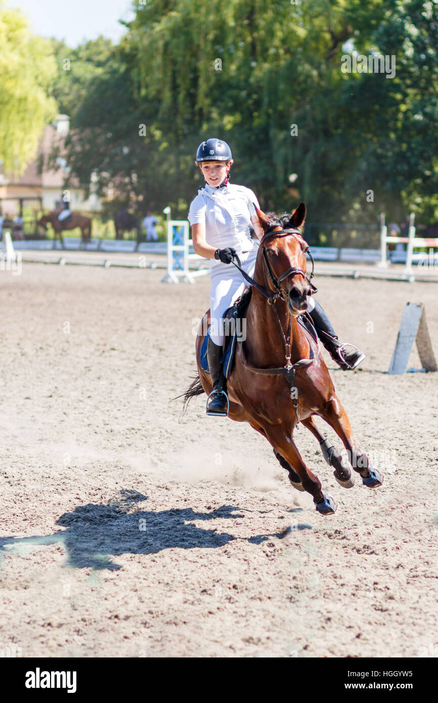 Young rider girl on equestrian competition Stock Photo - Alamy