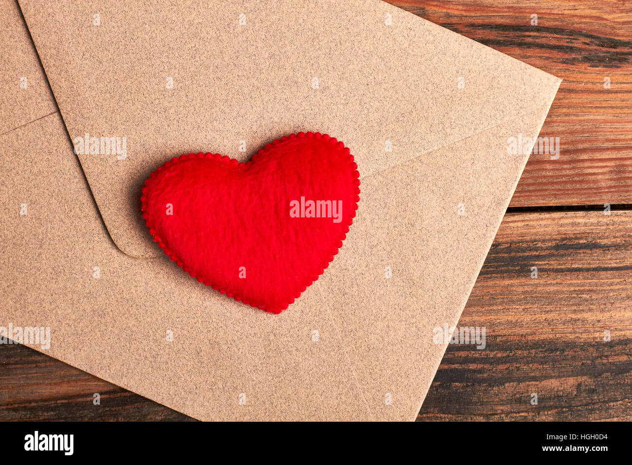 Red heart on envelope Stock Photo - Alamy