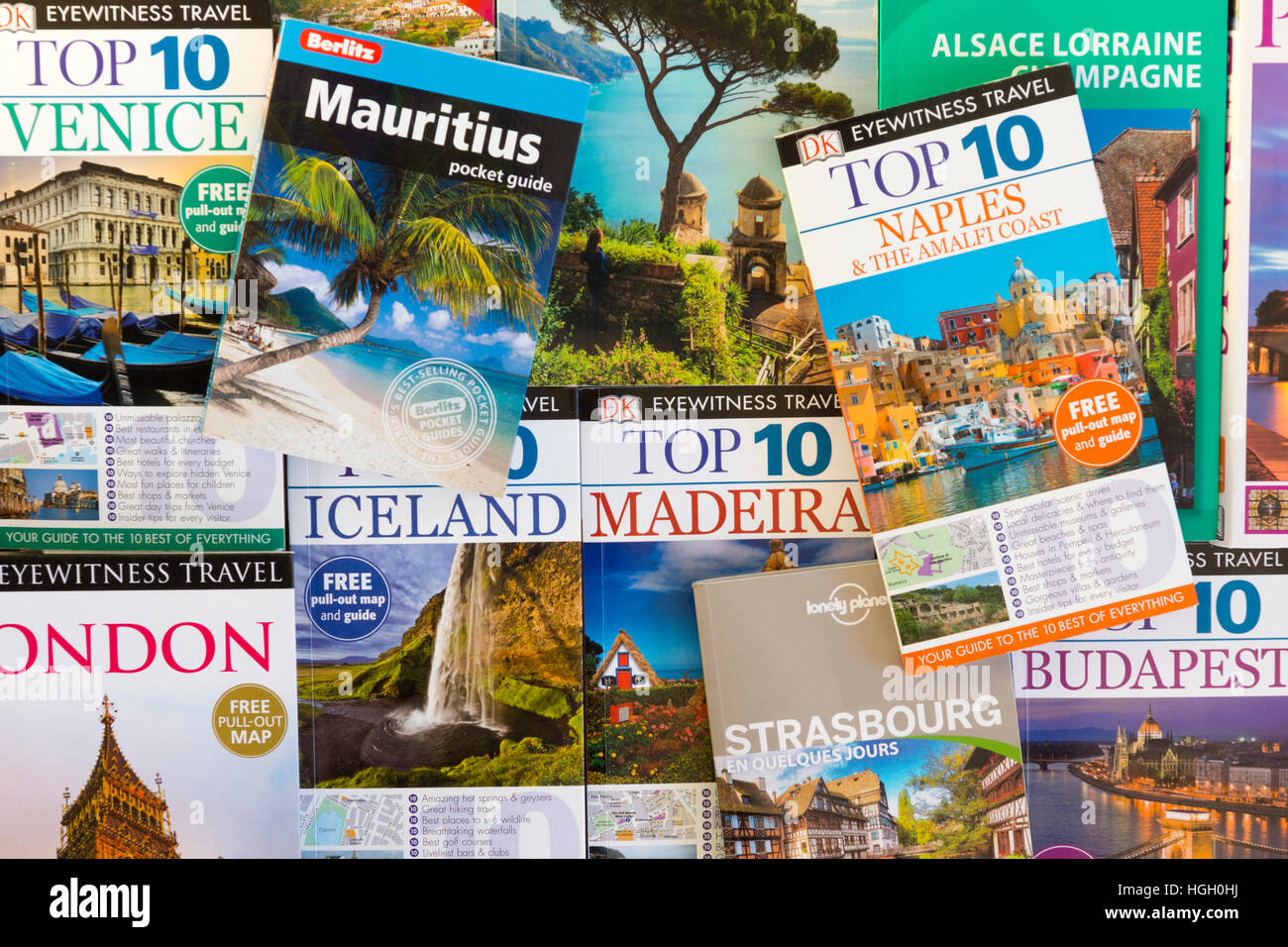 Travel books showing the theme of travel Stock Photo - Alamy