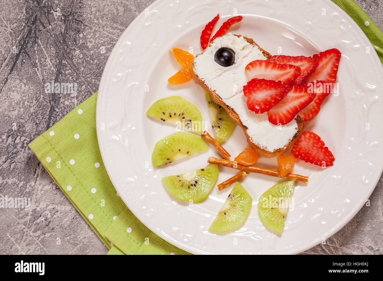 Kid's breakfast toast with fruit and cream cheese Stock Photo - Alamy