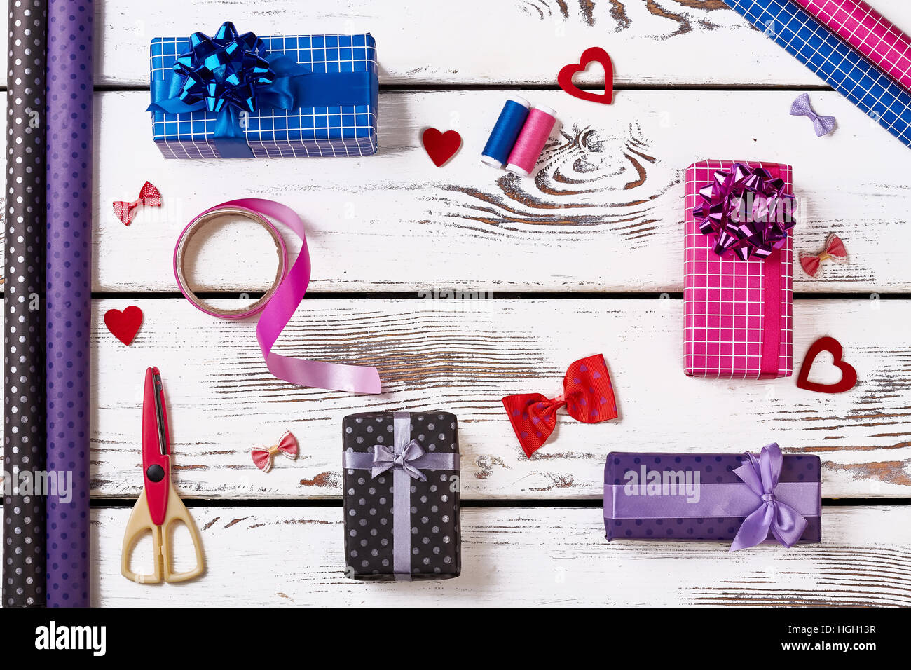 Present boxes and wrapping paper Stock Photo - Alamy