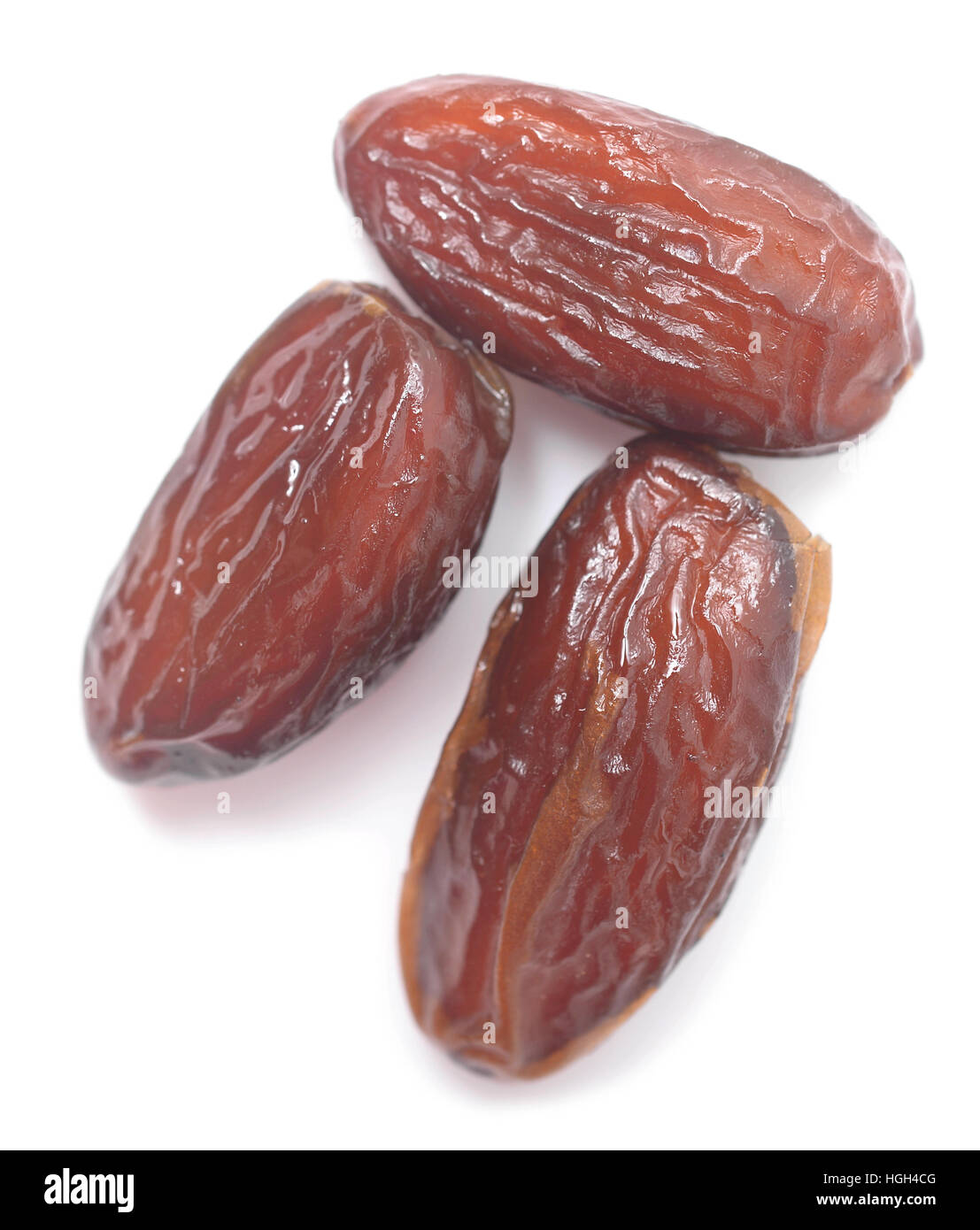 dates isolated on white background Stock Photo - Alamy