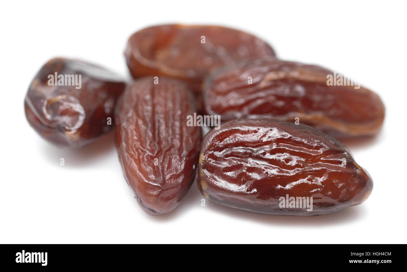 dates isolated on white background Stock Photo - Alamy