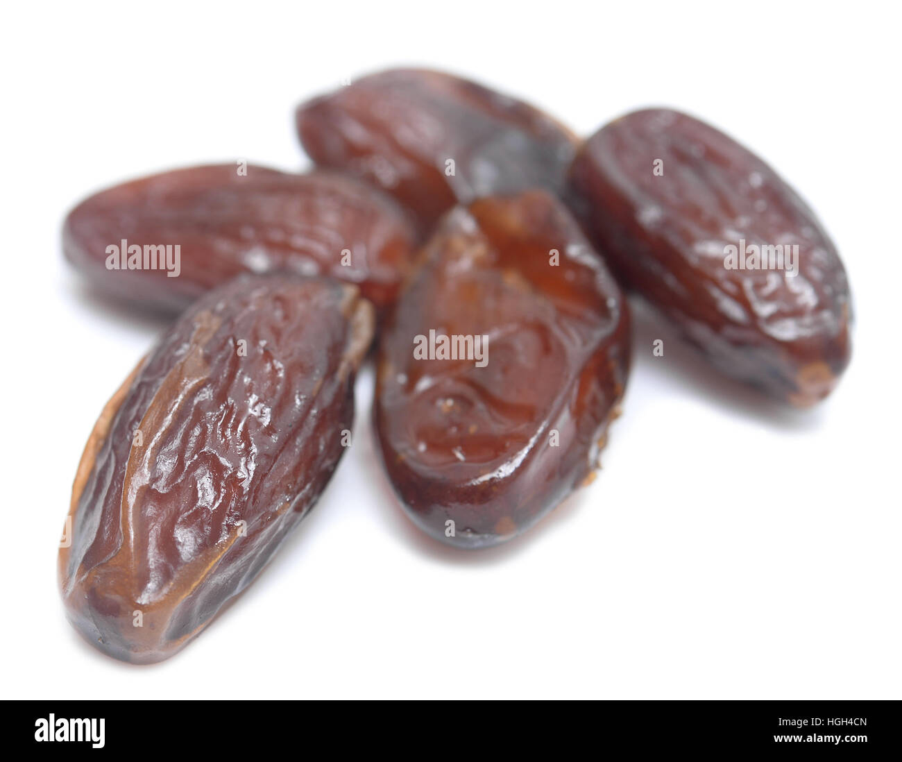 dates isolated on white background Stock Photo - Alamy