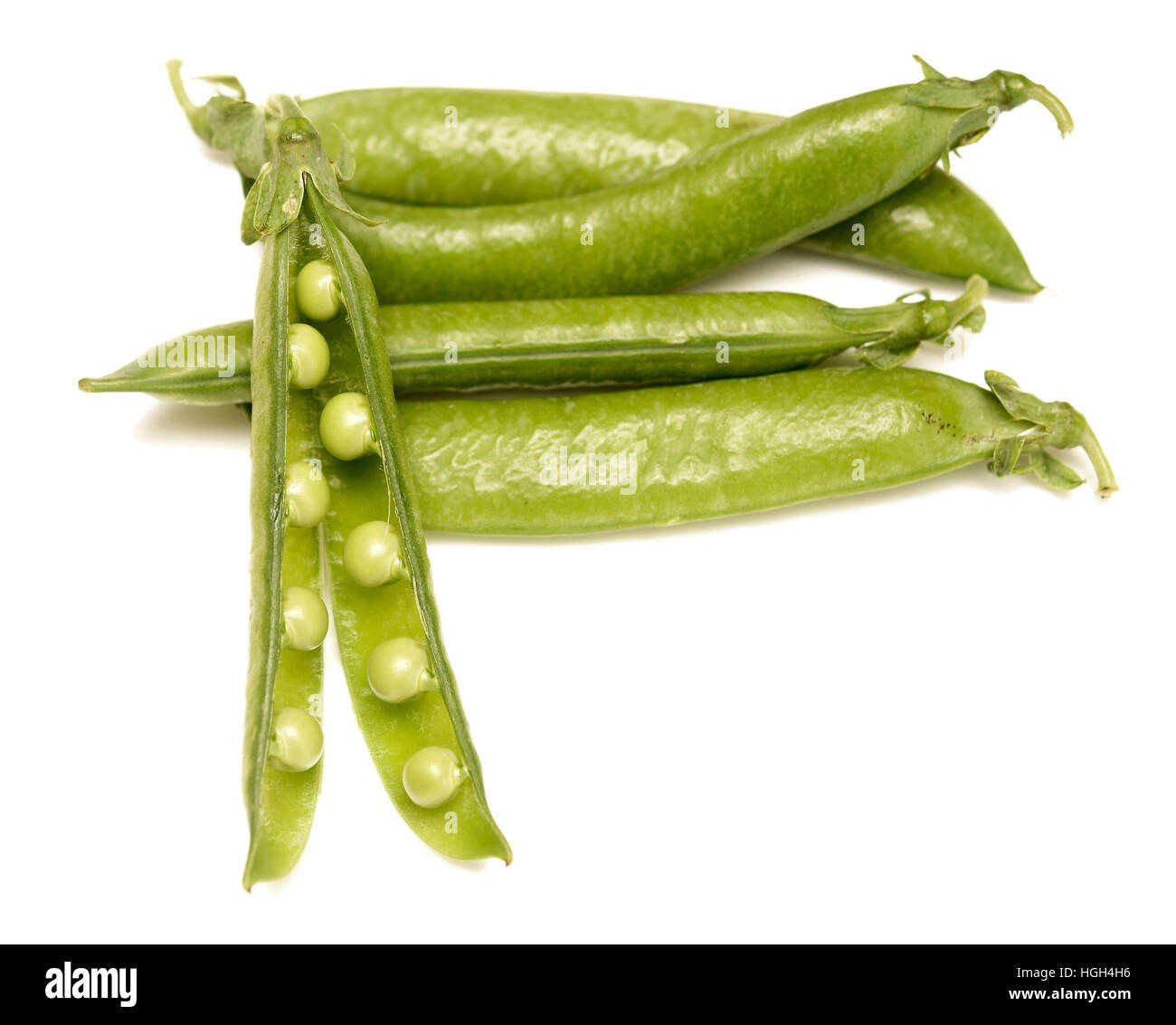 pea pods isolated on white background Stock Photo - Alamy