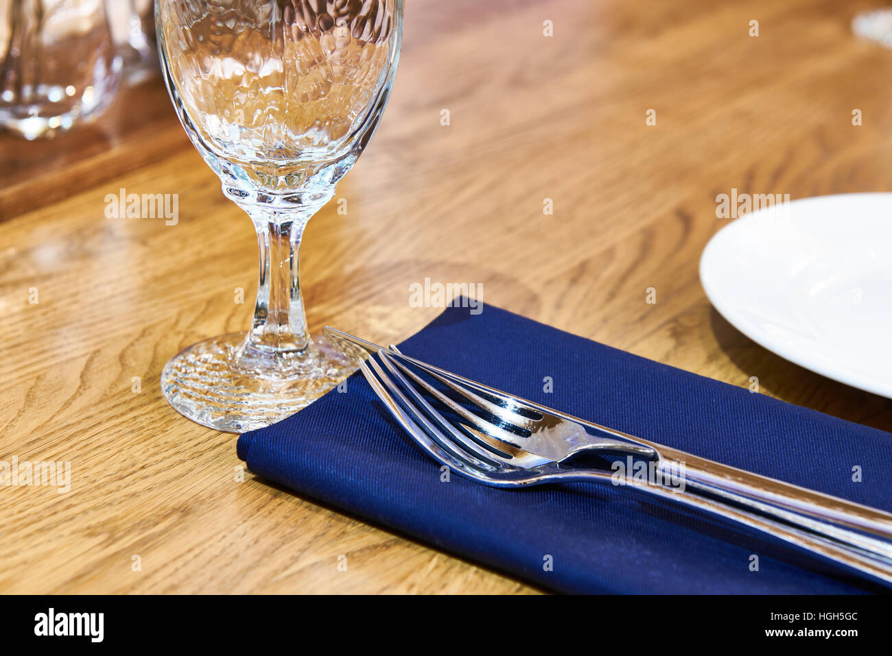 Serving dinner table in a restaurant Stock Photo - Alamy
