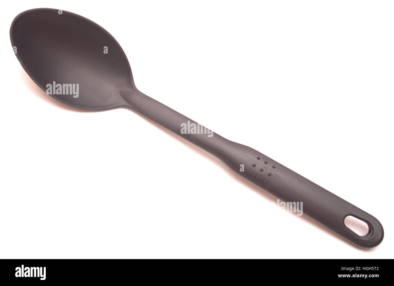 kitchen plastic spoon isolated on white background Stock Photo - Alamy