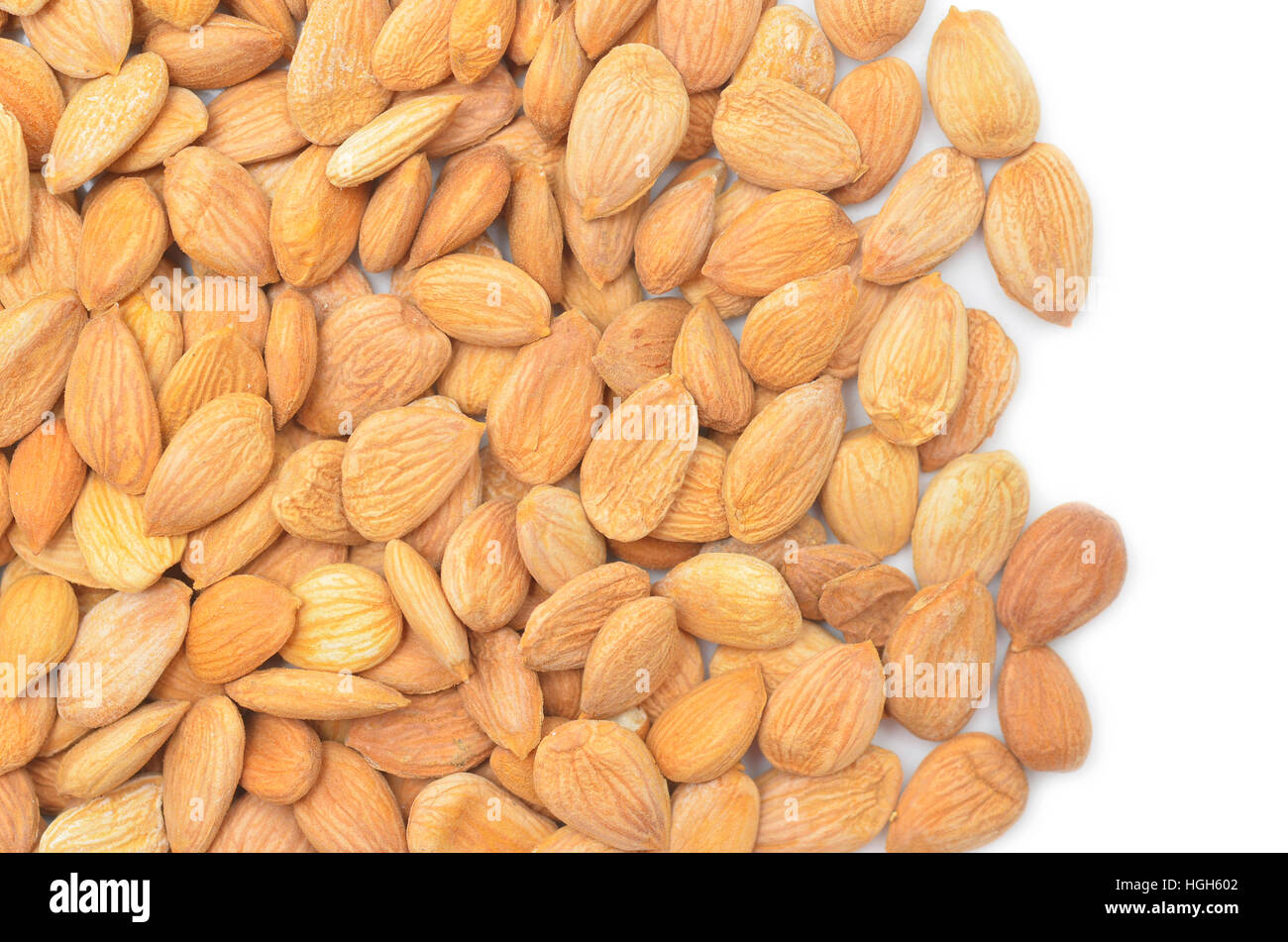 apricot almonds isolated on white background Stock Photo - Alamy