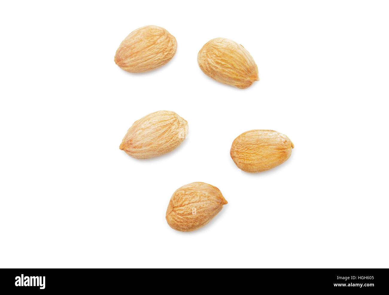 apricot almonds isolated on white background Stock Photo - Alamy