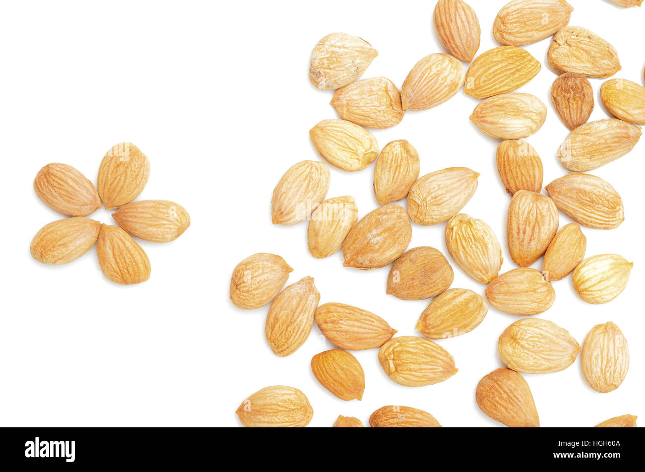 apricot almonds isolated on white background Stock Photo - Alamy