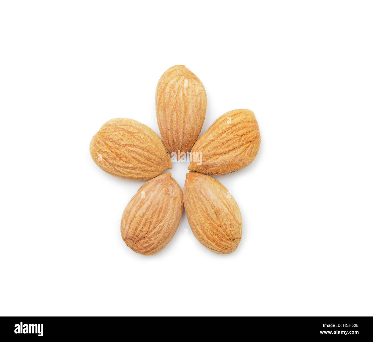 apricot almonds isolated on white background Stock Photo - Alamy