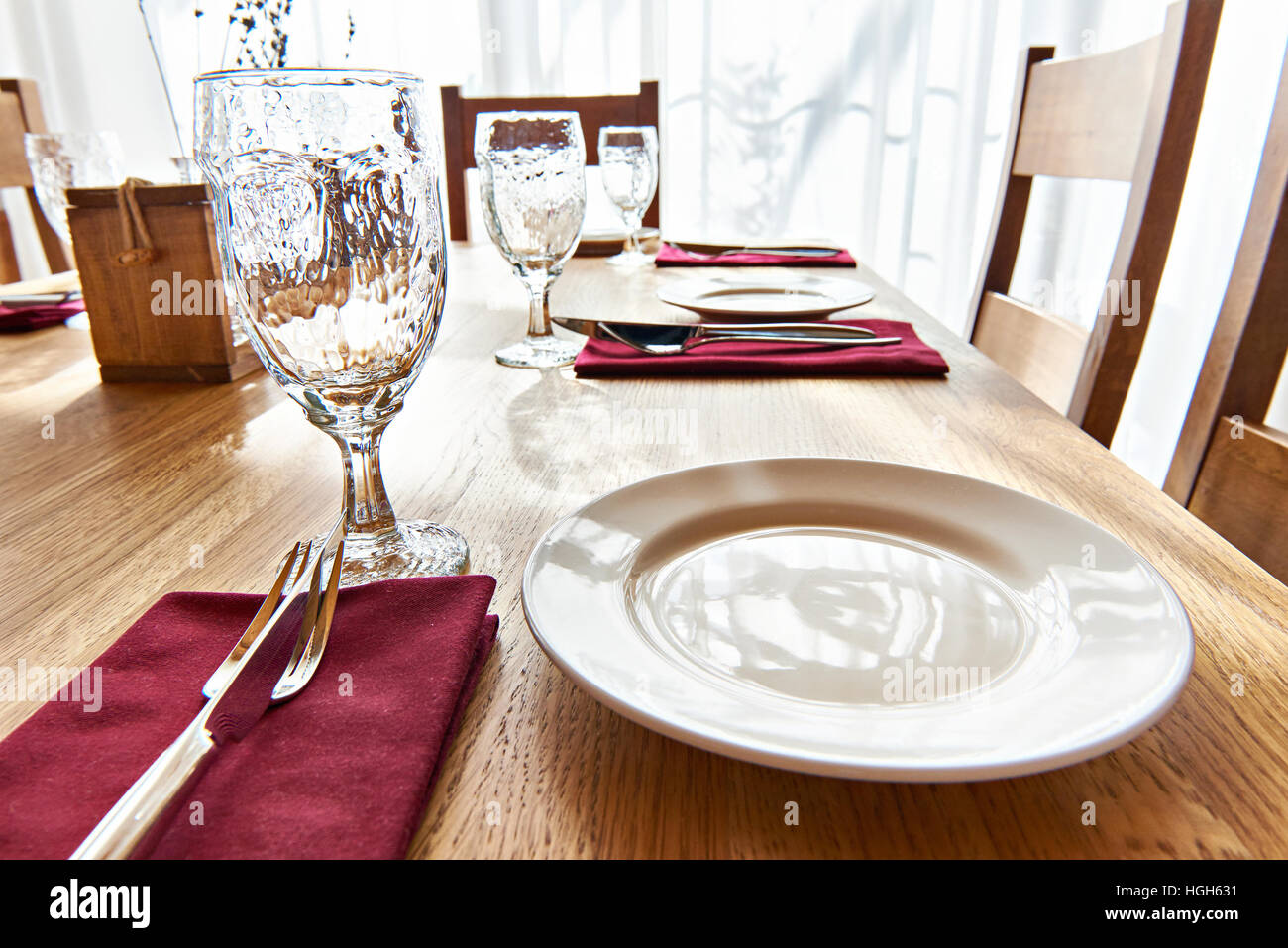 Serving dinner table in a restaurant Stock Photo - Alamy