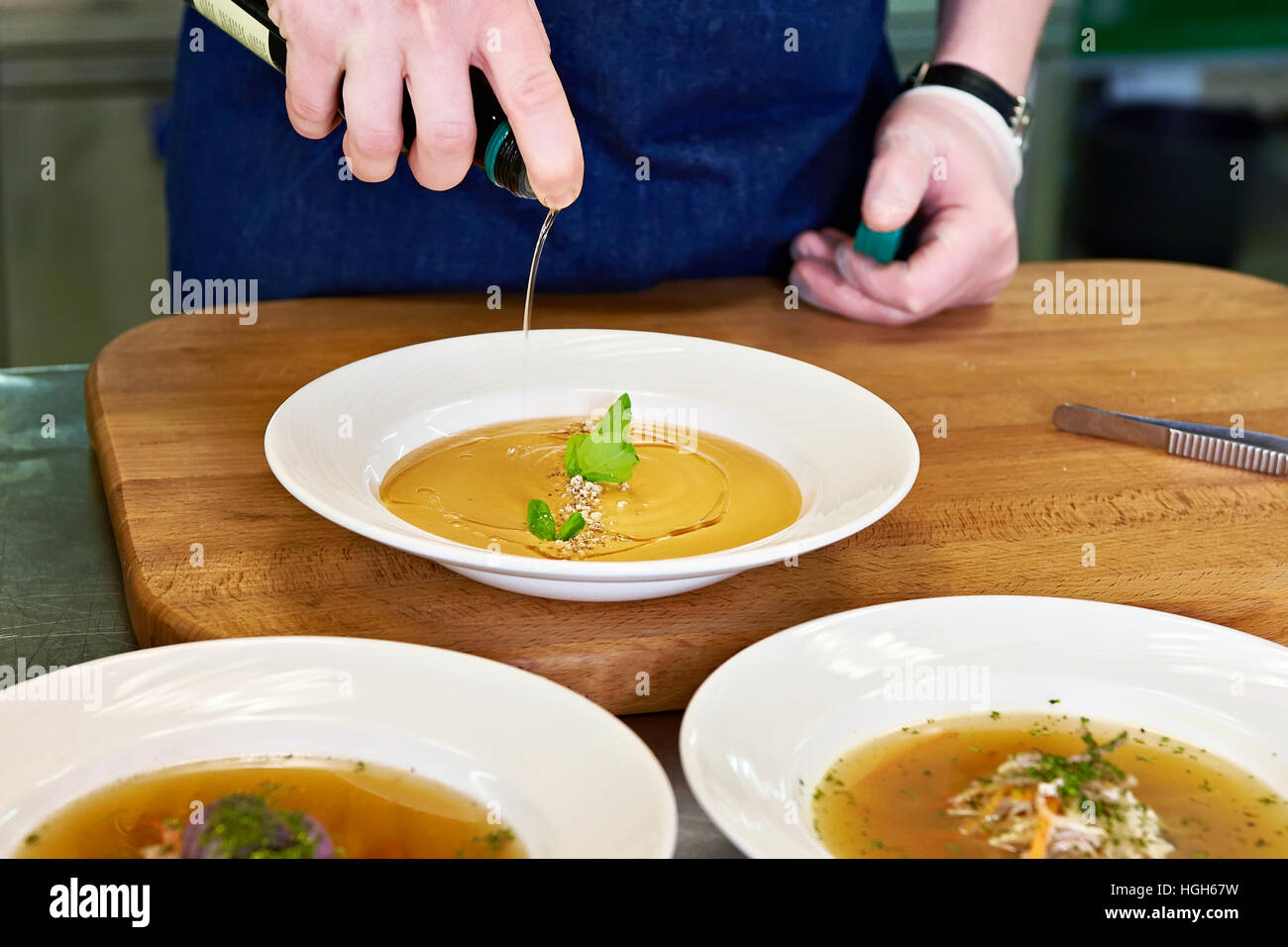 Preparing dishes - vegetable soup on the restaurant kitchen Stock Photo ...