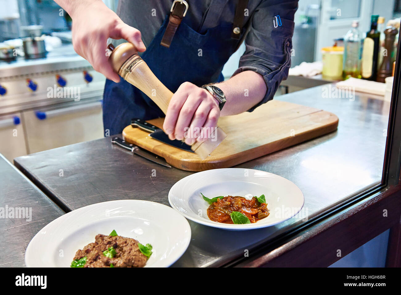 Cooking vegetable appetizers and salads in the kitchen of the ...