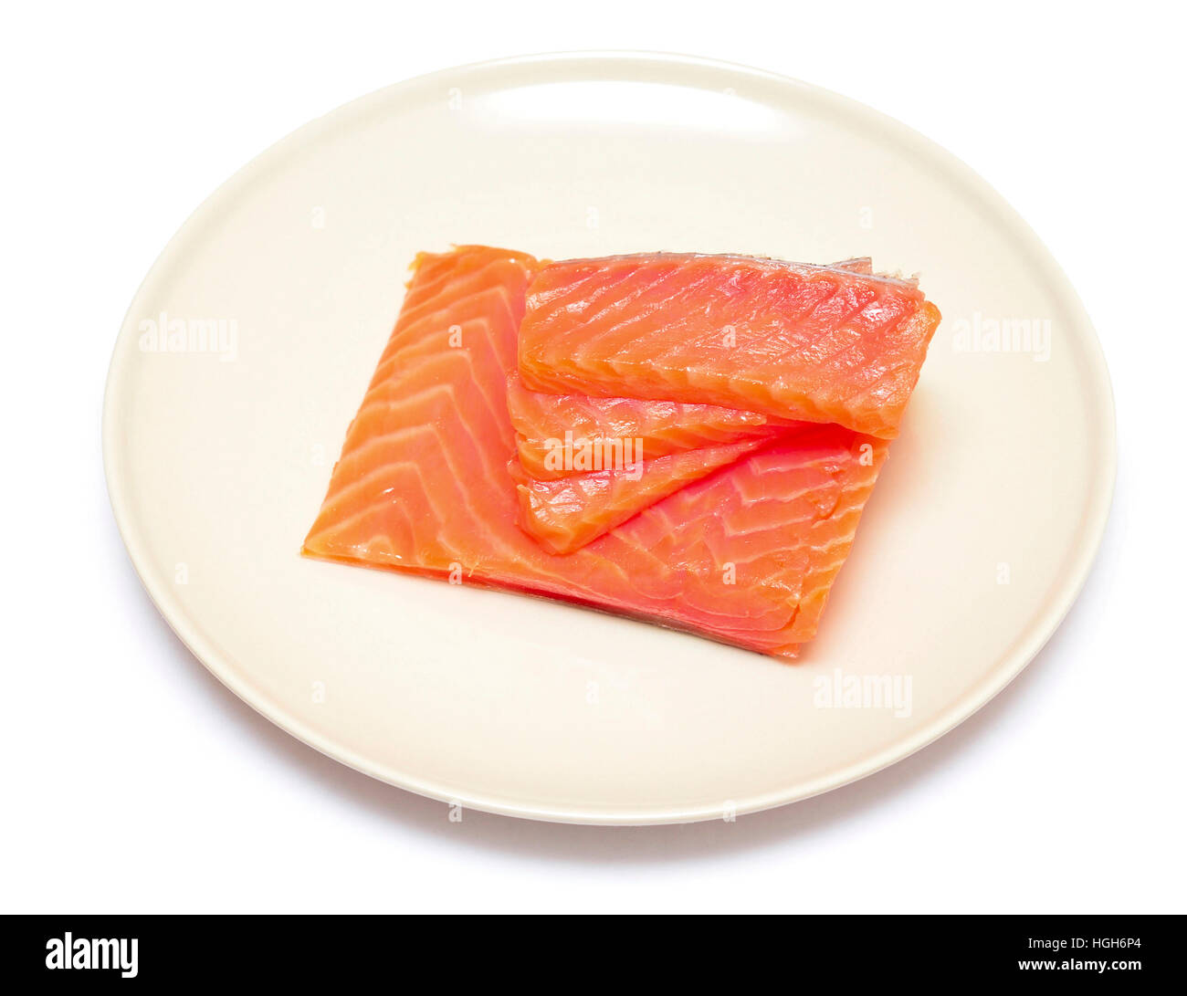 Red fish on the plate isolated on white background Stock Photo - Alamy