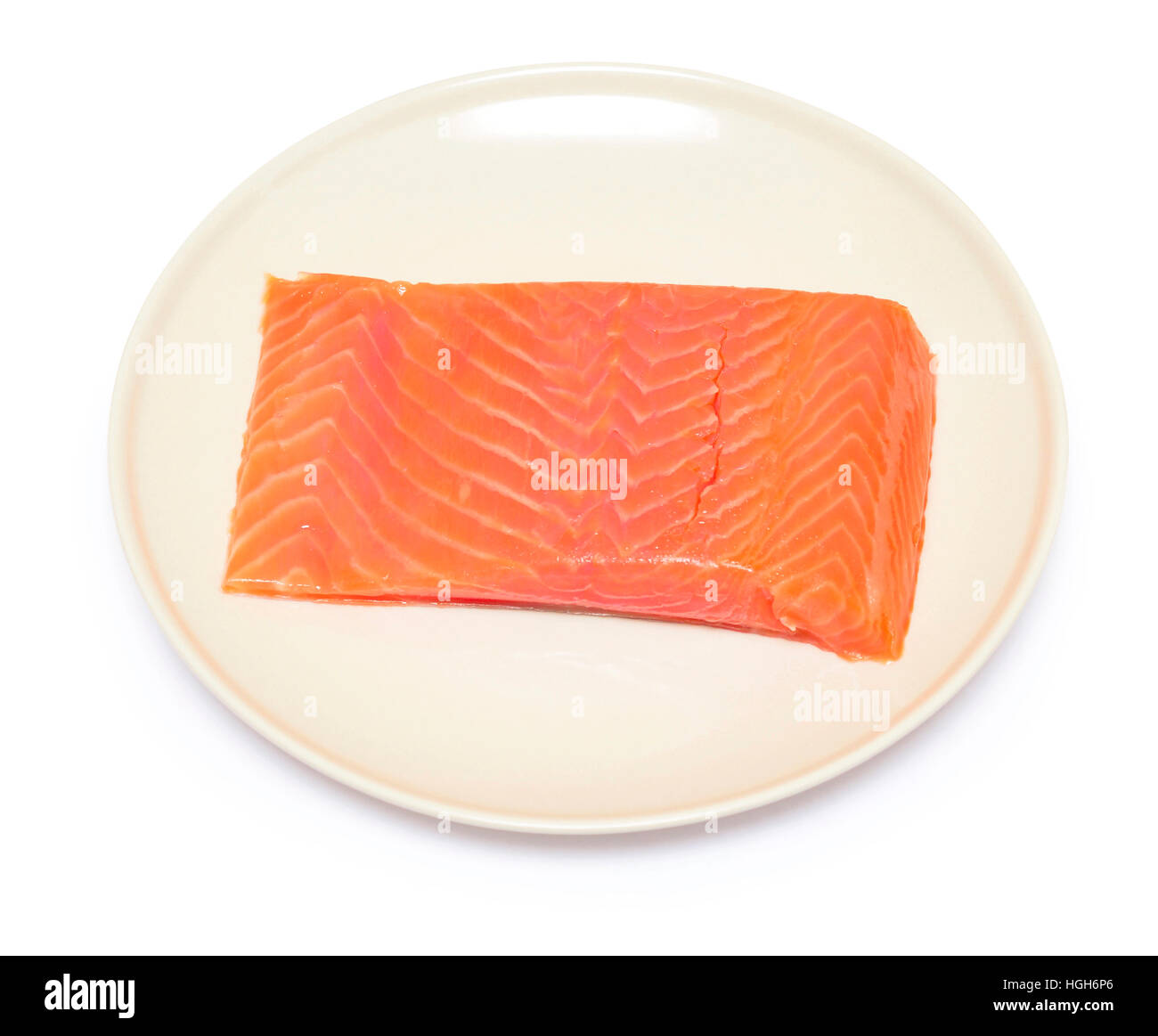 Red fish on the plate isolated on white background Stock Photo - Alamy
