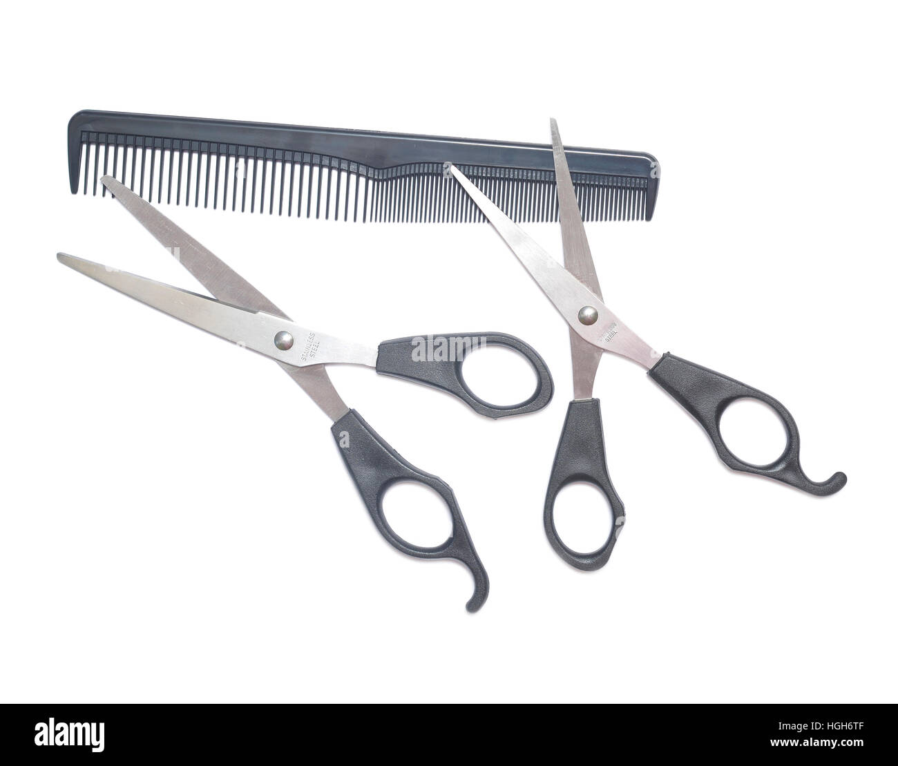 scissors, comb isolated on white background Stock Photo - Alamy
