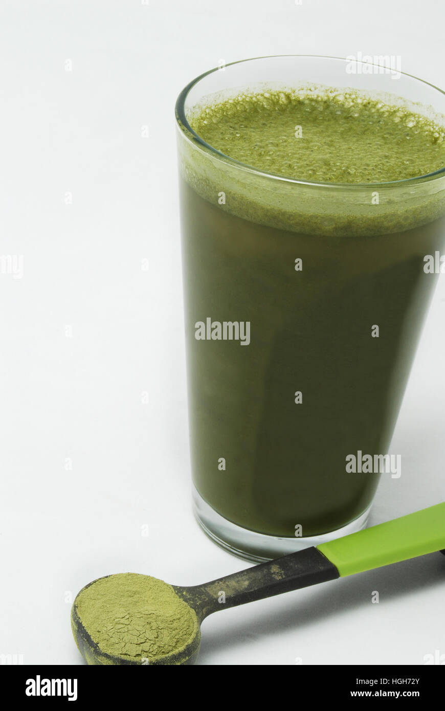 Green Healthy Drink with Tablespoon of Green Powder. Could be a Green ...