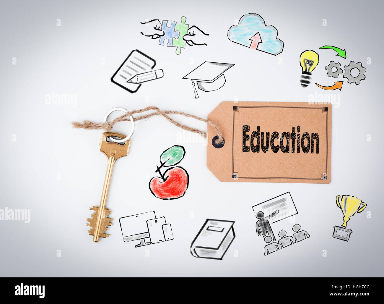 Education. Key and a note on a white background Stock Photo - Alamy