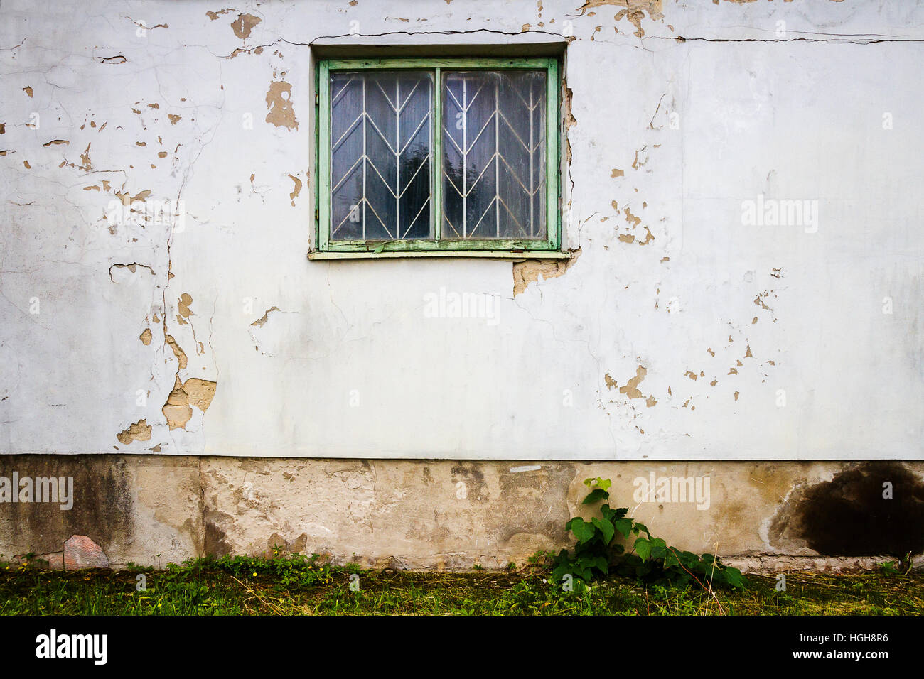 Old white street wall with a window Stock Photo - Alamy