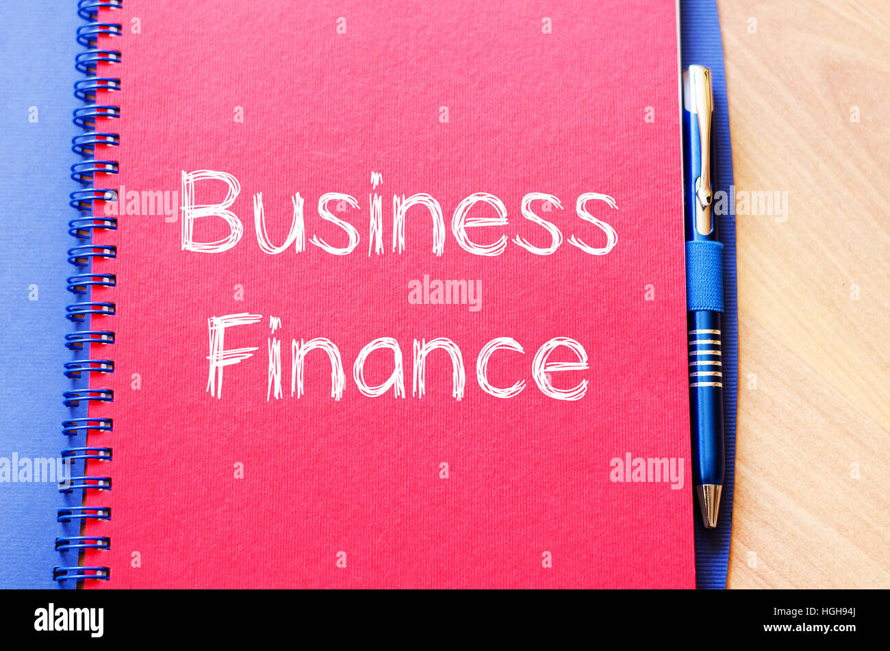 Business finance text concept write on notebook Stock Photo - Alamy