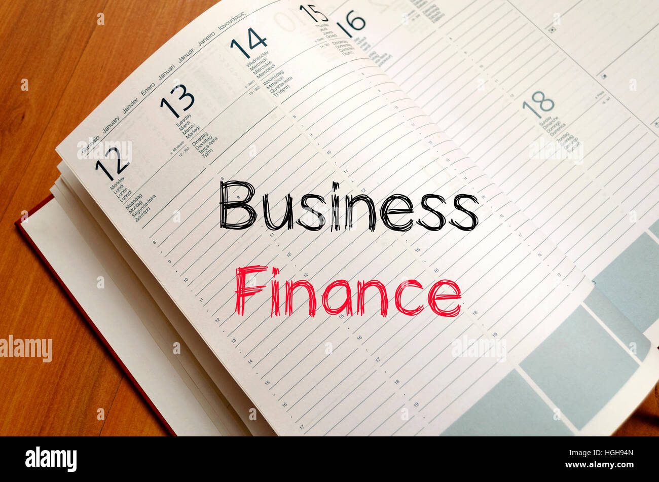 Business finance text concept write on notebook Stock Photo - Alamy