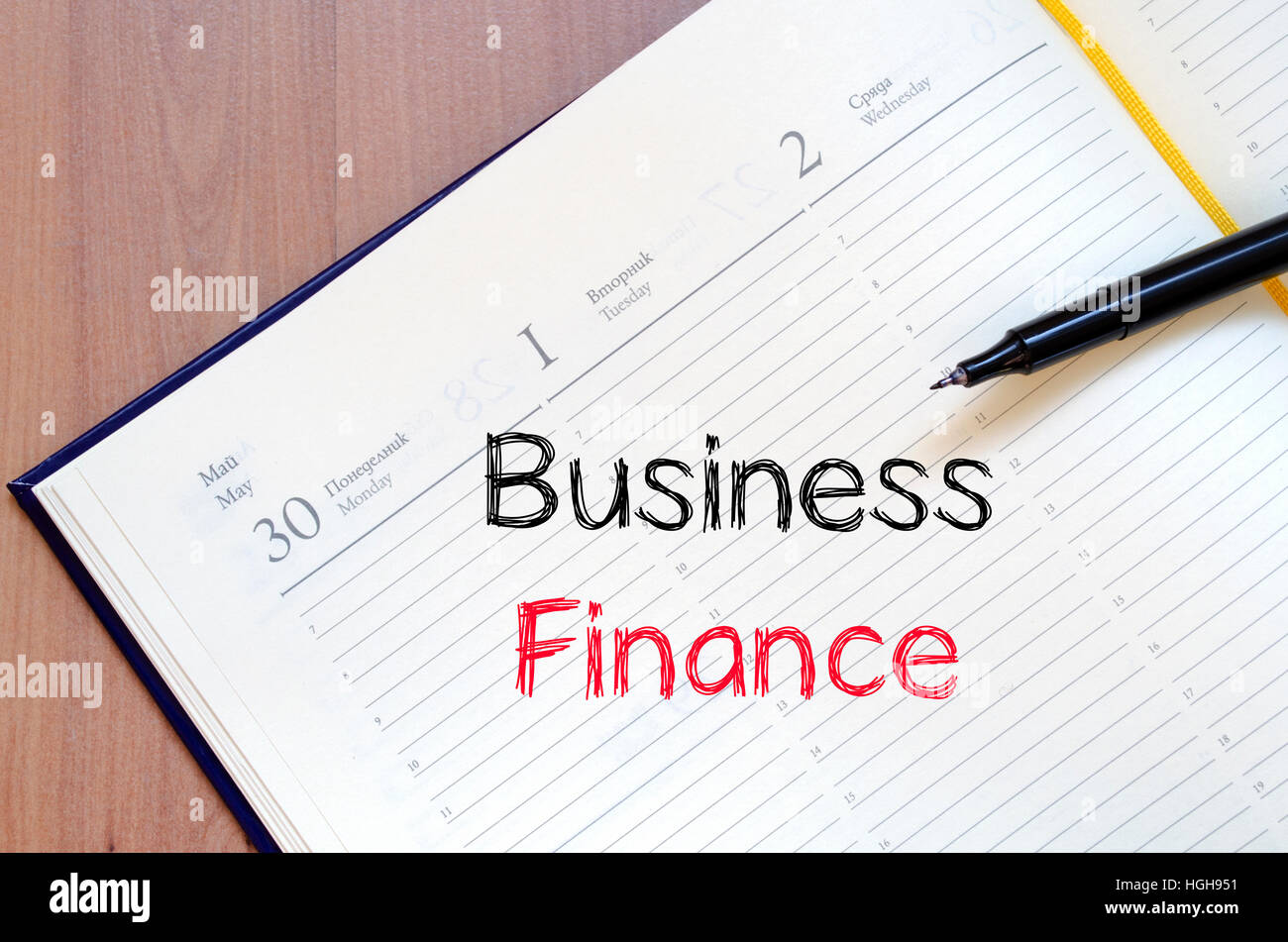 Business finance text concept write on notebook Stock Photo - Alamy