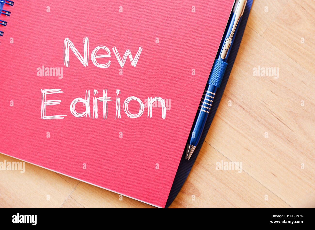 New edition text concept write on notebook Stock Photo - Alamy