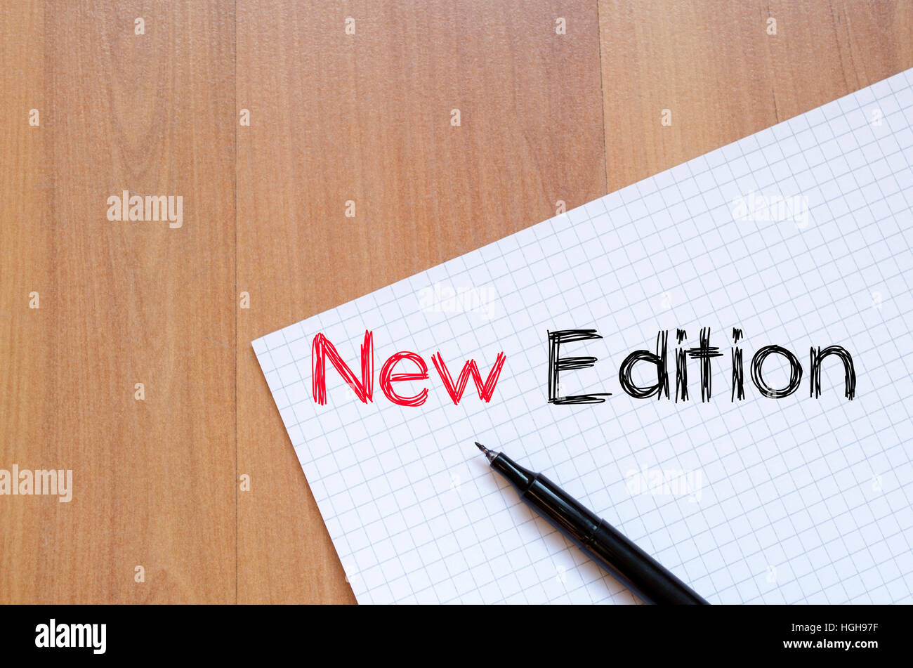 New edition text concept write on notebook Stock Photo - Alamy
