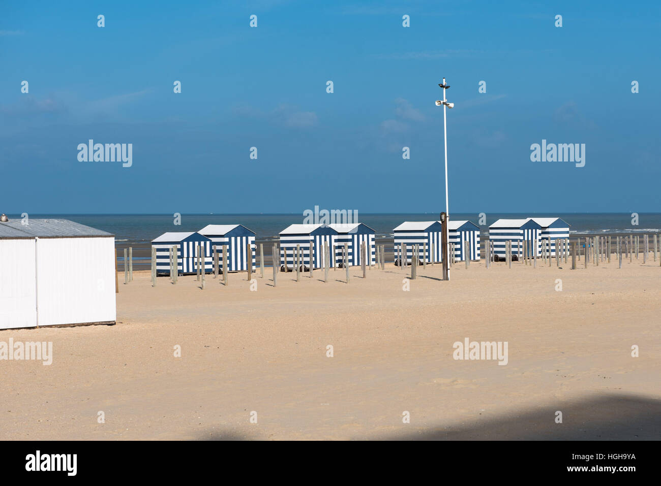 Beach in Koksijde, Belgium on the North Sea with beach huts Stock Photo ...