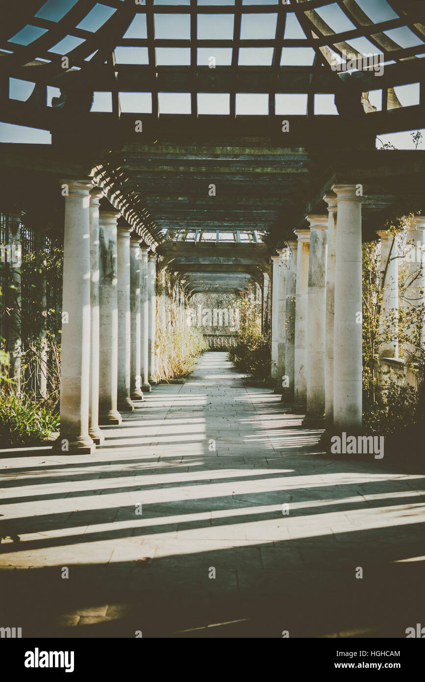 Row of columns leading away into horizon Stock Photo - Alamy