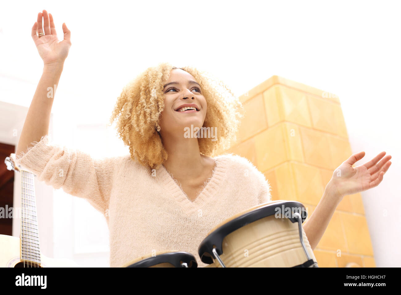 Music. Create your own music. Tapping the rhythm on the drums. Bongos ...