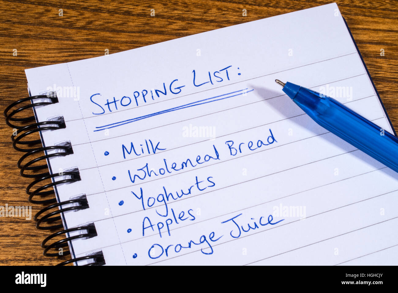 A Shopping List Written In A Notepad Stock Photo Alamy