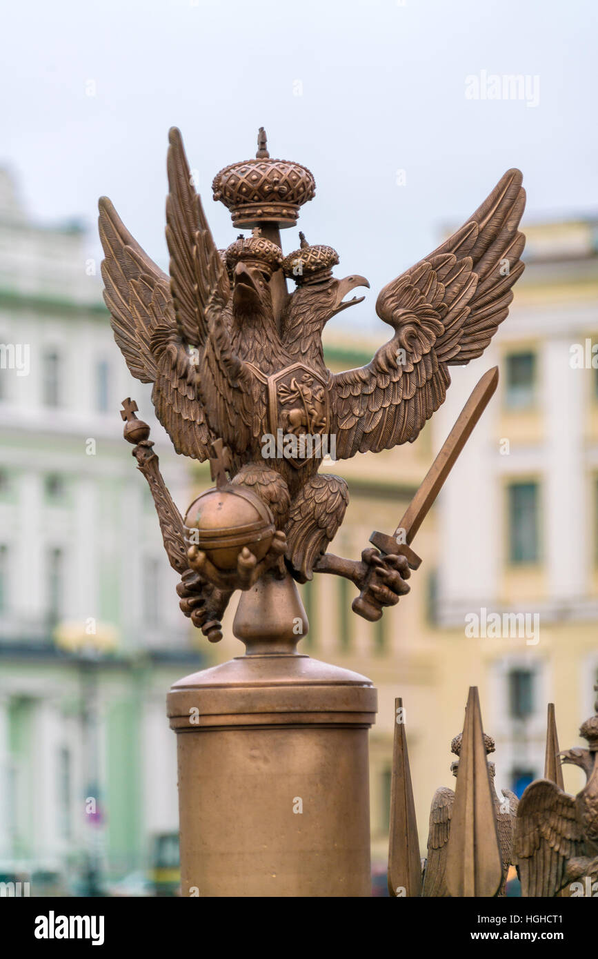 Two headed eagle coat of the arms of Russian empire on fence of ...