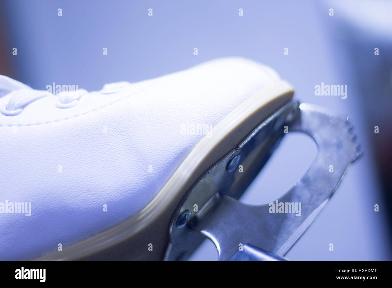 Ice skates in skate store shop window on display on sale for skating on ...