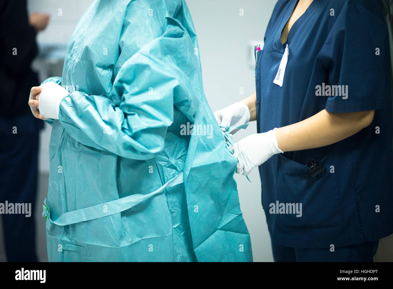 Surgeon in hospital surgery in sterile uniform "scrubs" in operating ...